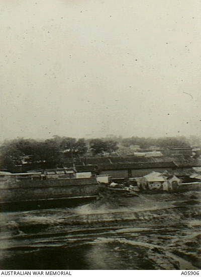PEKING, CHINA. 1900. A GROUP OF BUILDINGS WITH LOOPHOLES USED BY BOXER ...