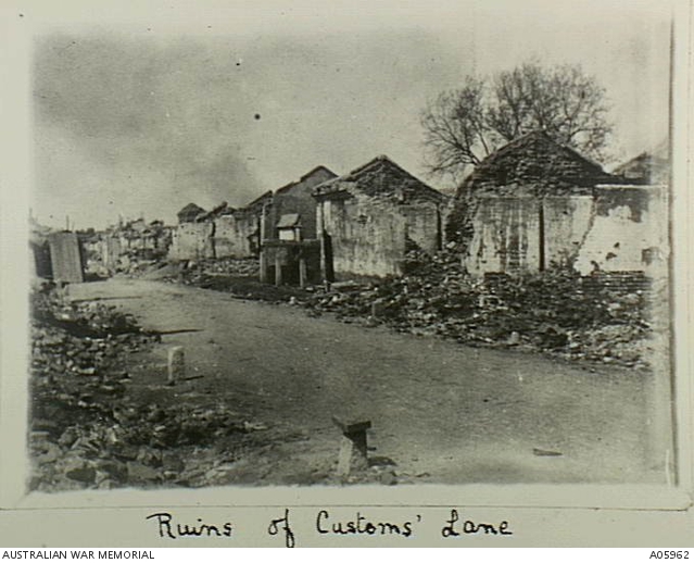 PEKING, CHINA. 1900. RUINED BUILDINGS ALONG CUSTOMS LANE DURING THE ...