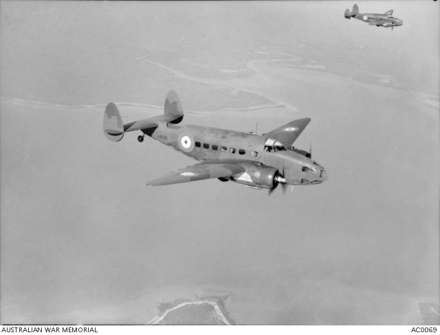 In flight, Lockheed Hudson, A16-66; believed unit of No. 13 Squadron ...