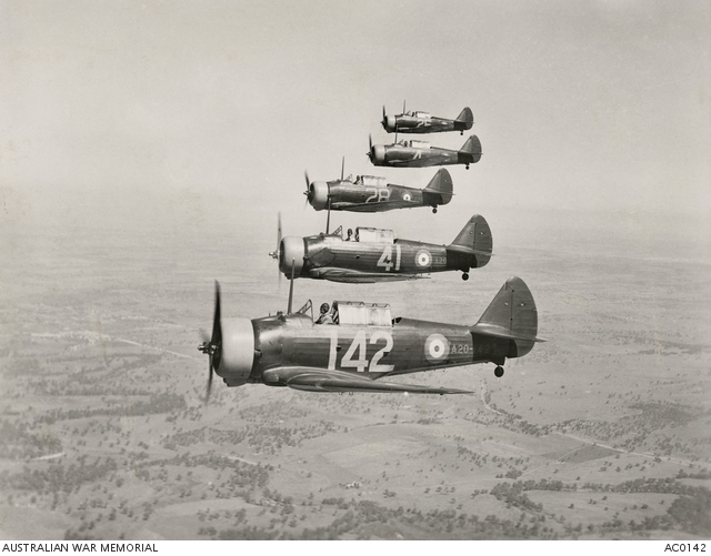 WIRRAWAYS, FIVE IN "ECHELON RIGHT STEPPED UP" FORMATION. AT NO 2 ...