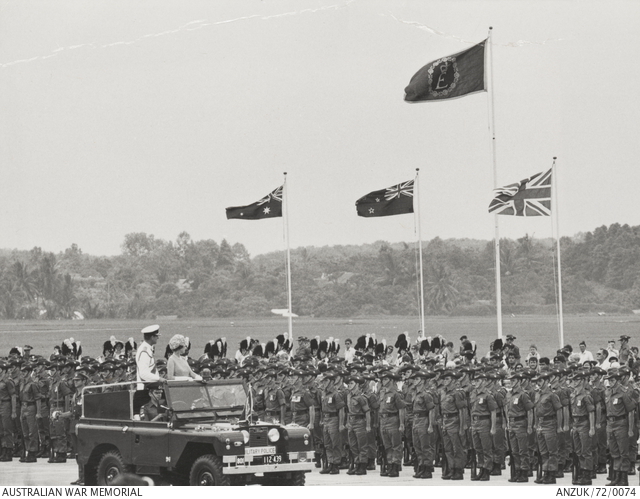 Singapore. 1972-03. The Royal Pennant tops the flags of the three ...