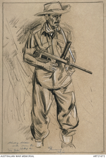 Standing soldier with owen gun | Australian War Memorial