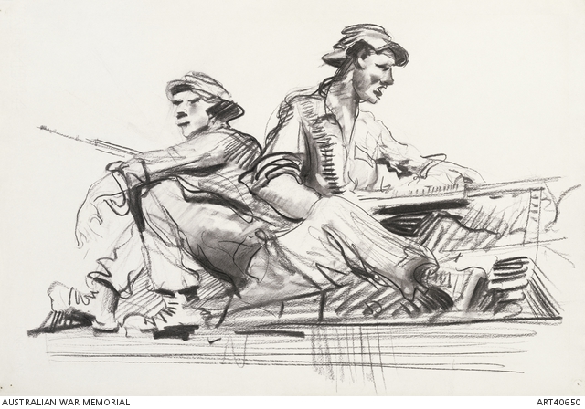 Two Australian soldiers sitting on an armoured personnel carrier on ...