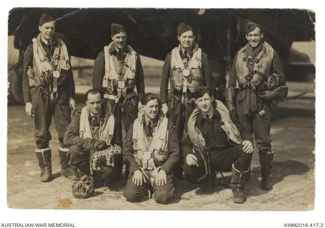 Informal outdoor group portrait of members of 460 Squadron RAAF at RAF ...