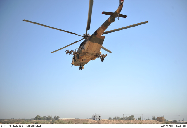 An Iraqi MI-17 conducts a ‘hot extraction’ lift off during an air ...