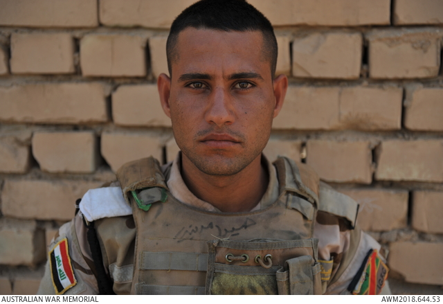 An Iraqi soldier and Mosul veteran displays his weary and tired face ...