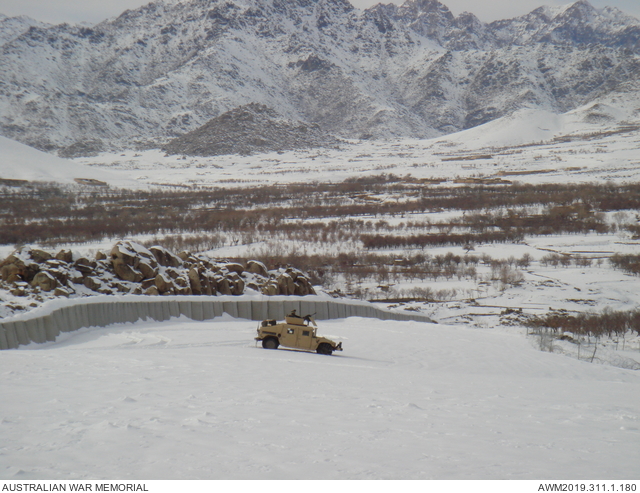On the ground in snow covered FOB Baylough, Zabul Province, Afghanistan ...