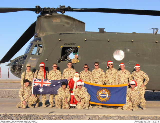 "Santa Comes to Kandahar". Crew members of C Squadron, 5th Aviation ...