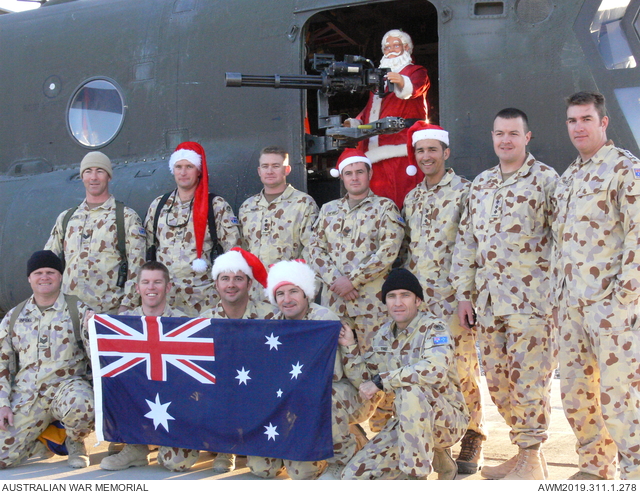 "Santa comes to Kandahar". Crew members of C Squadron, 5th Aviation ...