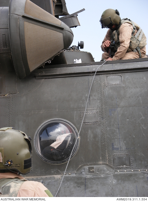 Aircrewman Technician Sergeant Garth Pregnell observes Aircrewman ...