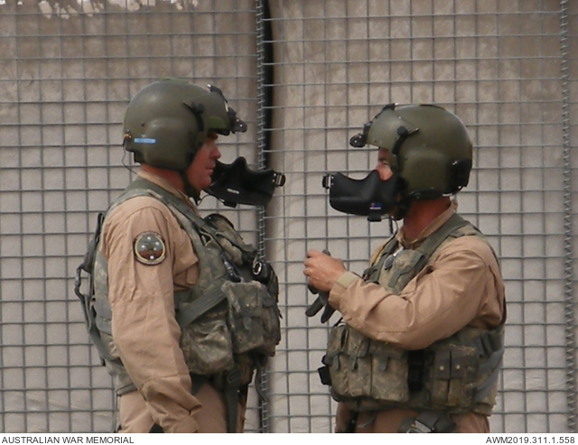 Aircrewman Sgt David Hanney (left) talking with Aircrewman Sgt Greg ...