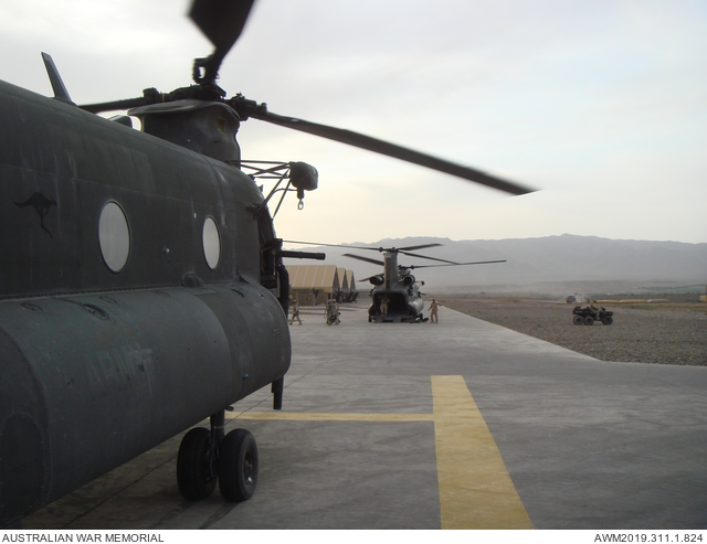 Looking west along the Dutch flight line at Tarin Kot. One of a series ...