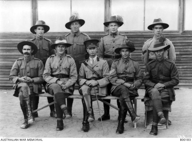 Group portrait of the Commanding Officer (centre front row) and Non ...