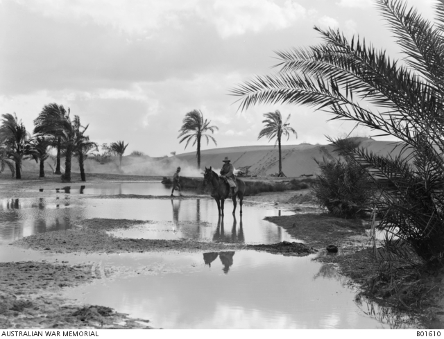 Belah. Two Light horsemen, one mounted on his horse at the pools of ...