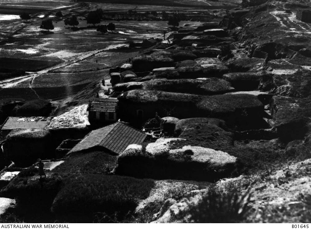 A view overlooking the roofs of the village of Mazar. Note the ...