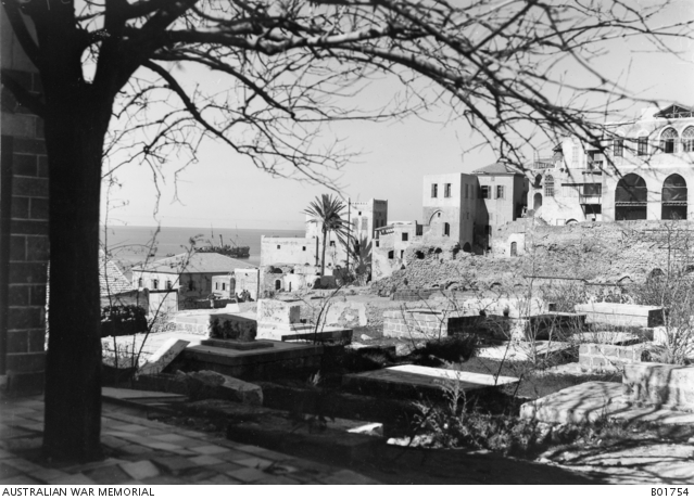A view of Old Jaffa. A ship can be seen at sea in the background. This ...