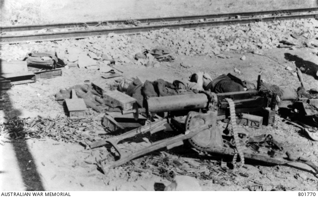 The bodies of two Turkish machine gunners who died at their post next a ...