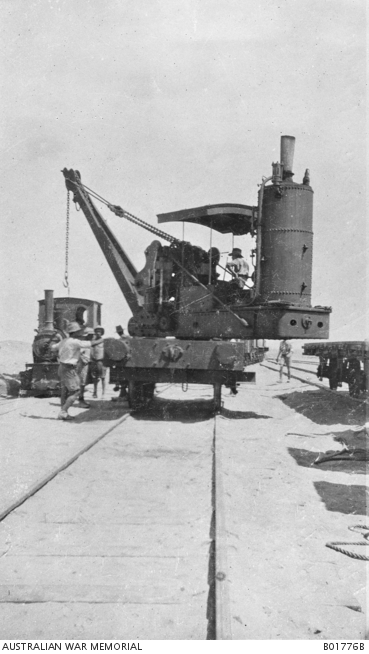 Small locomotives for the Gamli light railway, being unloaded from ...