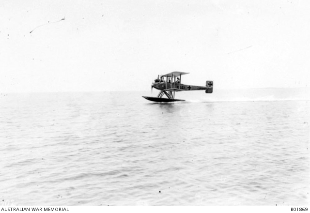 A full side view of a German seaplane, in lifting position, off the ...