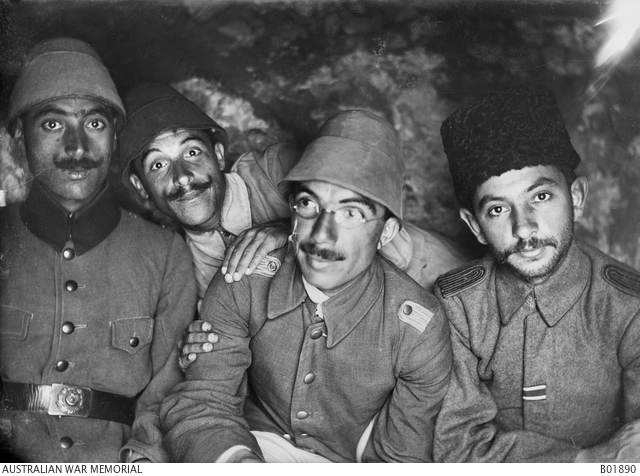 Four Turkish officers. The officer on the right is wearing a ribbon ...