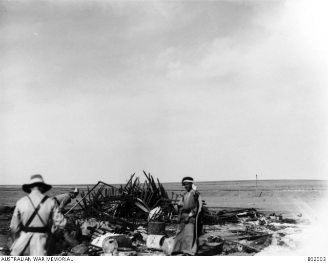 An Australian (left) and two Turkish soldiers and a local boy inspect ...