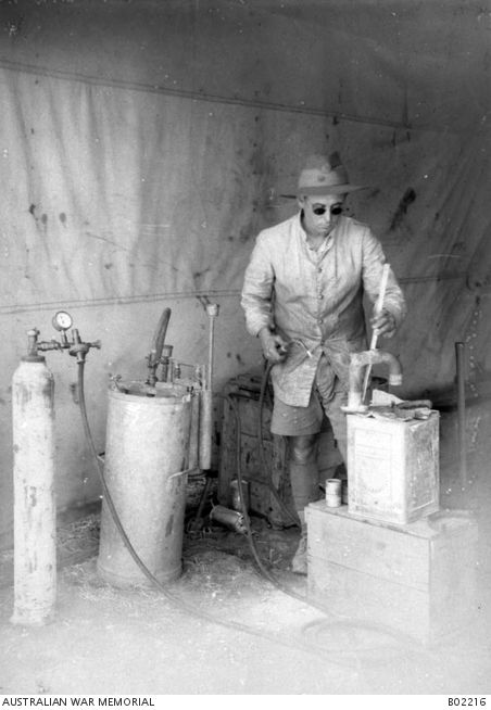 A mechanic of the 1st Squadron, Australian Flying Corps, engaged in ...