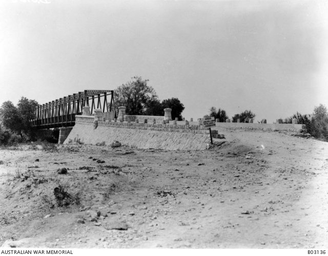 View of Allenby Bridge and the ornate embankment. A sign is at the left ...