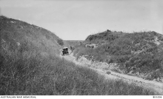 A Model T Ford travelling on the road through Mus Mus Pass ...