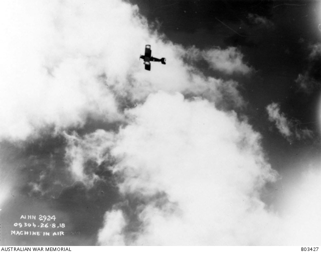Aerial photograph of a Bristol F2B fighter aircraft flying above the ...