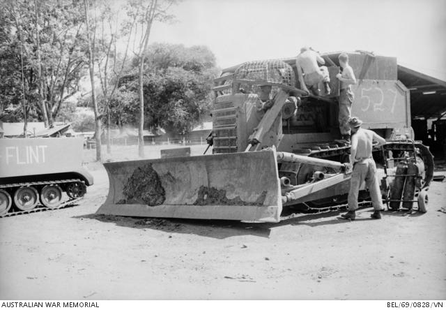 Nui Dat, South Vietnam. 1969-12. A D-8 bulldozer, No. 527, of the 1st ...