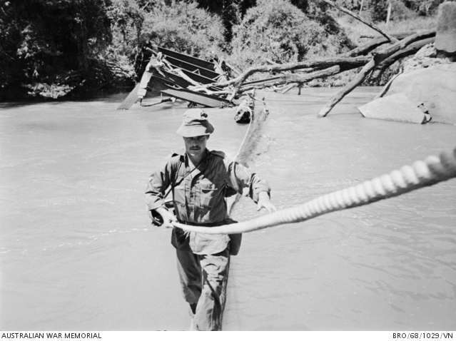 Private John Todd of Beaconsfield, WA, balances himself on a log while ...
