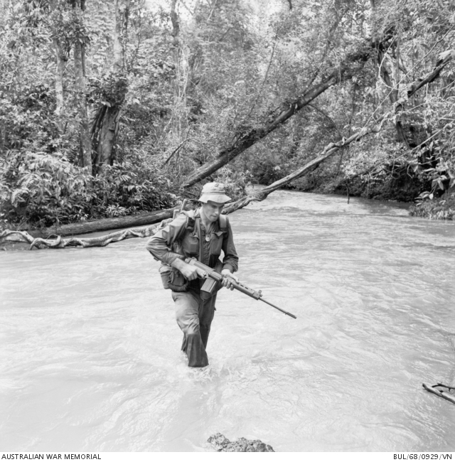 South Vietnam. 1968-10. Sapper Peter Graham of Goolgowi, NSW, makes his ...