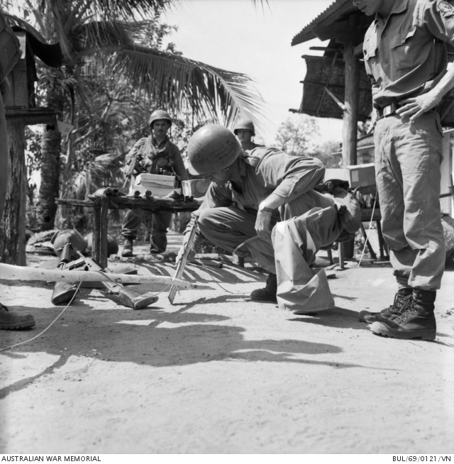 Hoa Long, South Vietnam. 1969-03-05. Carrying their SLR rifles ...