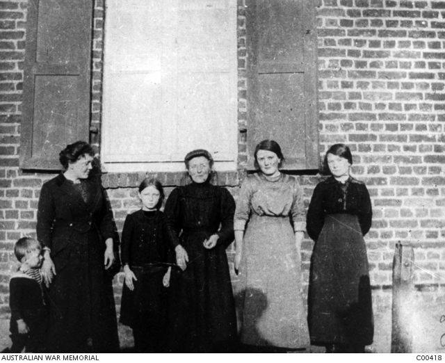 Group Portrait Of Six Members Of A French Family Encompassing Three 