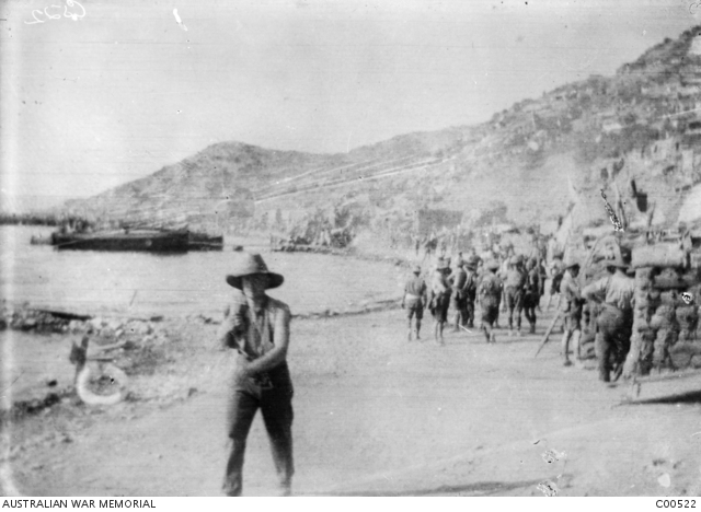 A view of Anzac Cove looking north to Ari Burnu. Soldiers are walking ...