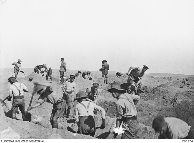 Men of the 21st Battalion digging trenches that formed part of the Suez ...
