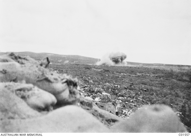A shell bursting on the Gallipoli Peninsula. | Australian War Memorial