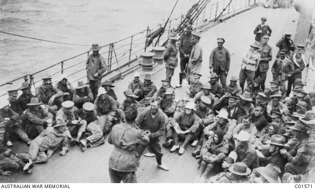 Troops watch a boxing match aboard the SS Port Nicholson on their first ...