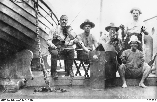 Informal group portrait of unidentified members of the ragtime band ...
