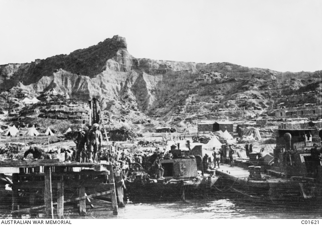 A view of the beach north of Anzac Cove. In the foreground some men are ...