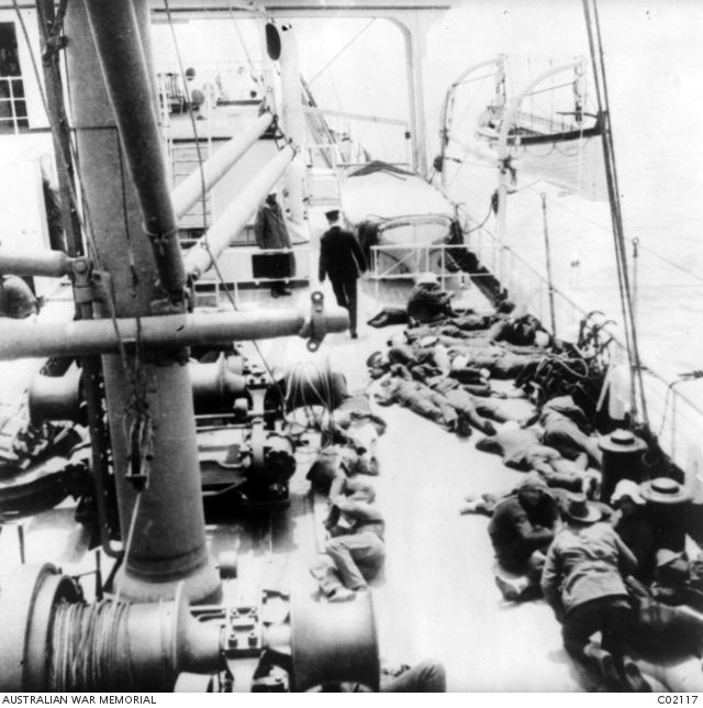 1st Division reinforcements relaxing on the deck of the transport HMAT ...