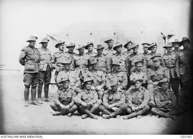 Group portrait of 25 unidentified members of a 1st Division field ...