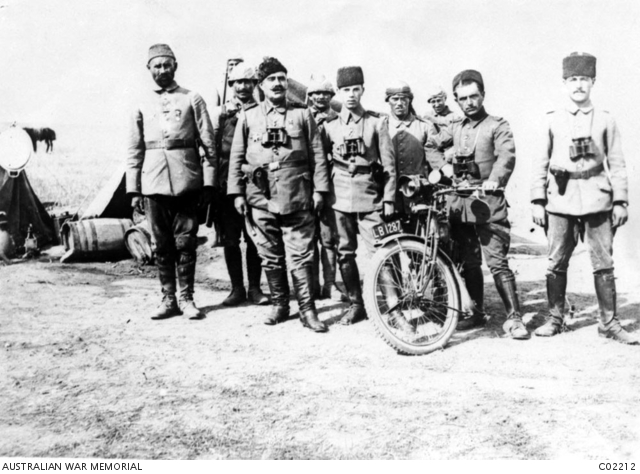 Group portrait of eight unidentified German and Turkish officers. One ...