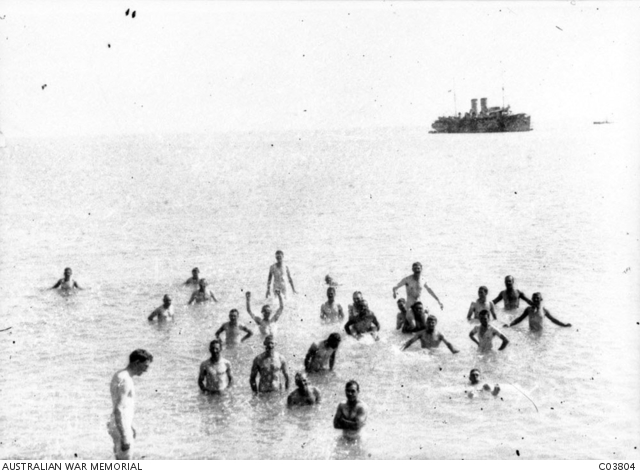 Australian Flying Corps mechanics bathing near the entrance to Port ...