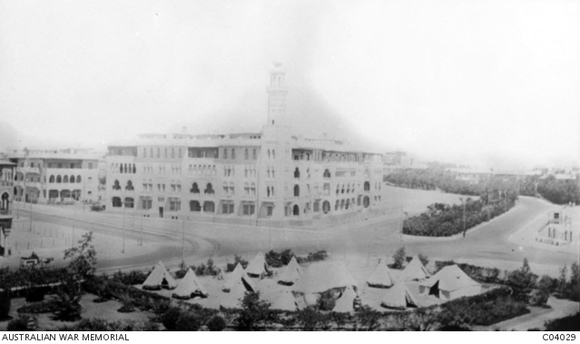 A typical building in Heliopolis. The tents in the foreground were ...
