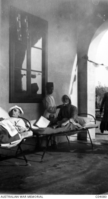 A native barber at work in an Australian Hospital in Cairo. These ...