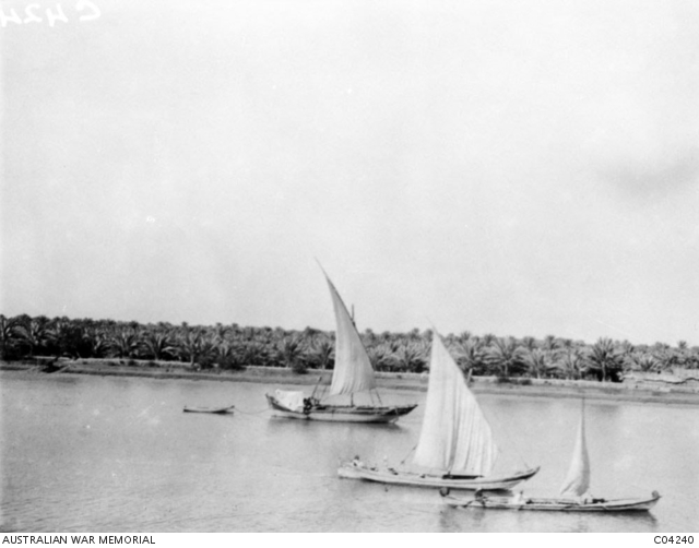 Natives sailing their mahalas on the Tigris River at Basraha. The ...