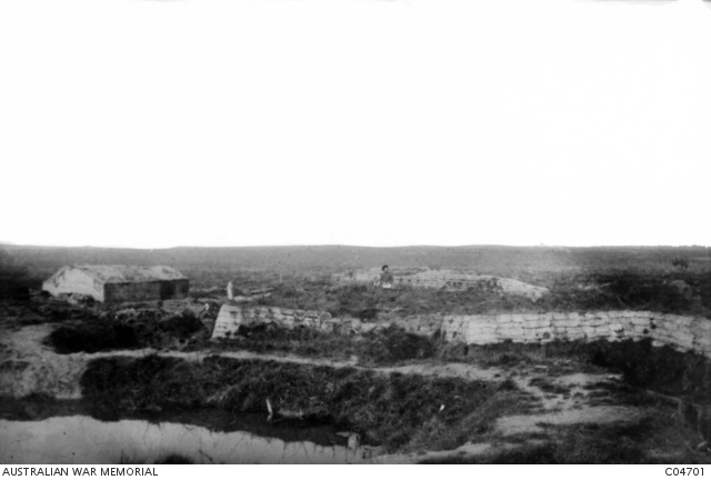 Sandbagged trenches and pill-box on Anzac Ridge. | Australian War Memorial