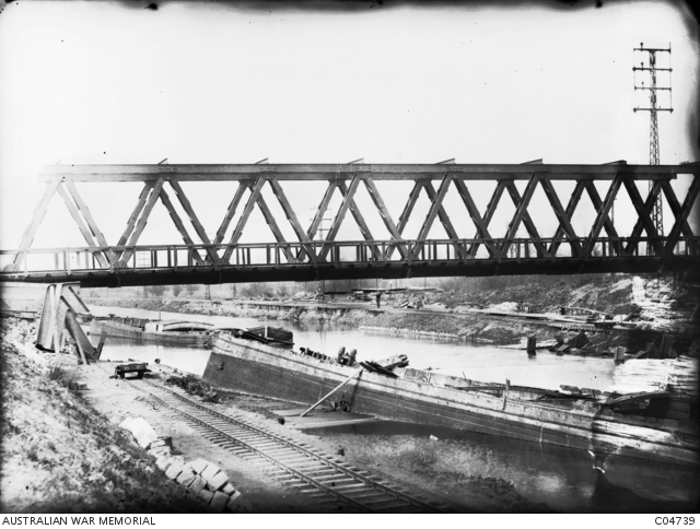 A 120 foot span steel bridge of the Hopkins type, constructed by a ...