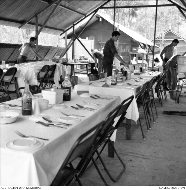 Vietnam. 1967. Tables set for a meal in the Sergeants Mess dining hall ...